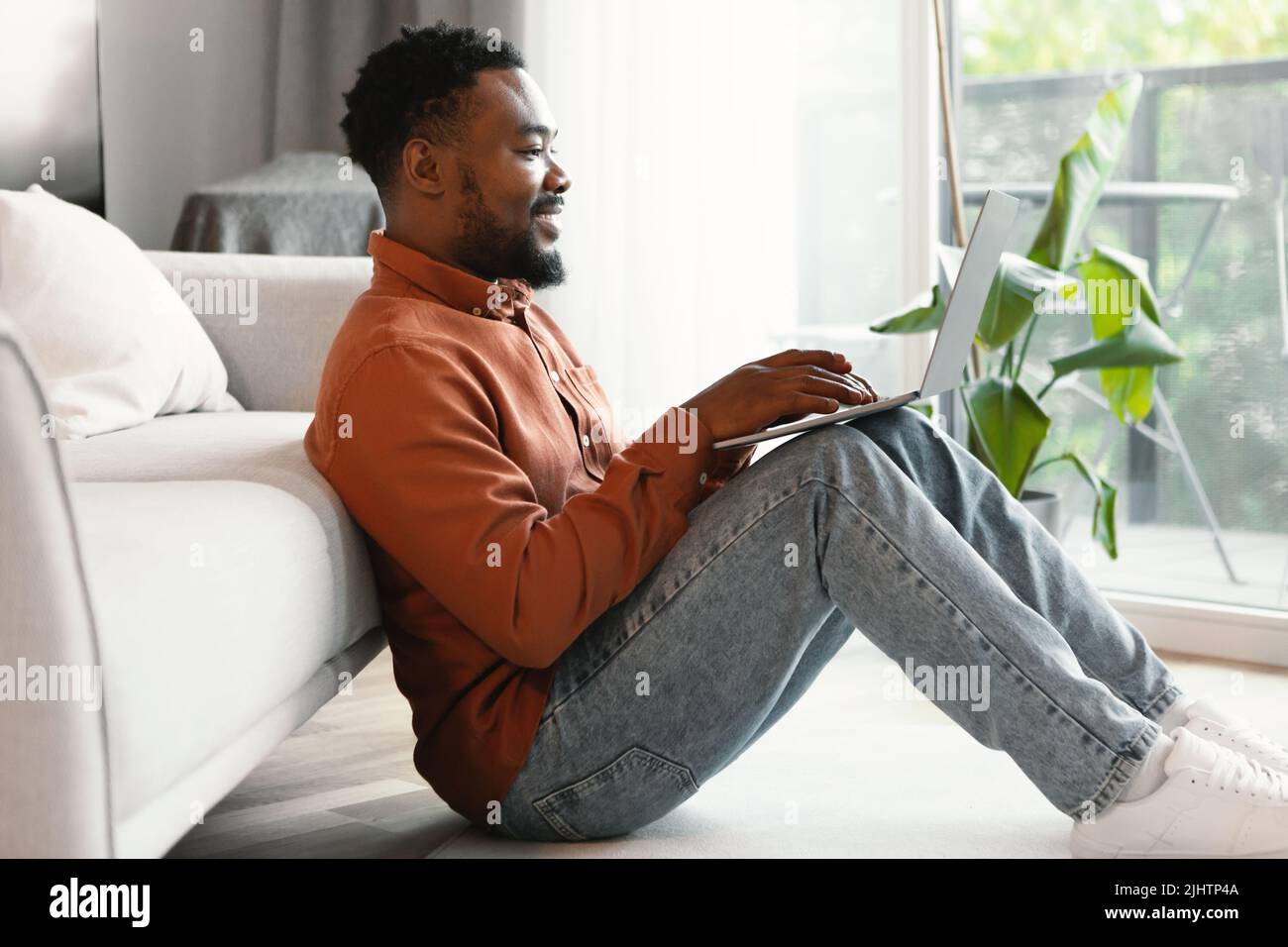 Side view freelancer using hi-res stock photography and images - Alamy