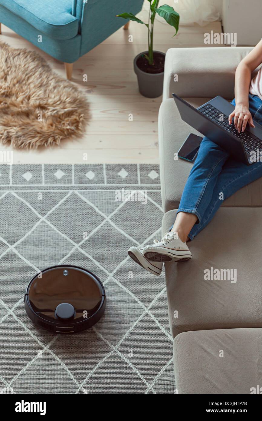 Woman cleaning couch vacuum cleaner hi-res stock photography and images ...