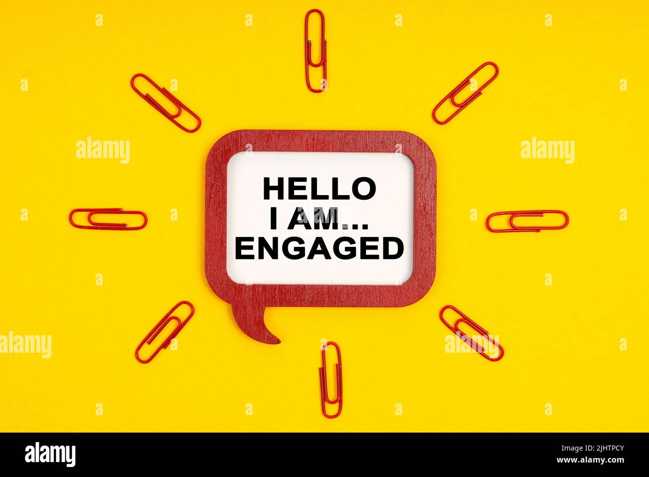 People and education concept. On a yellow background, paper clips and a ...