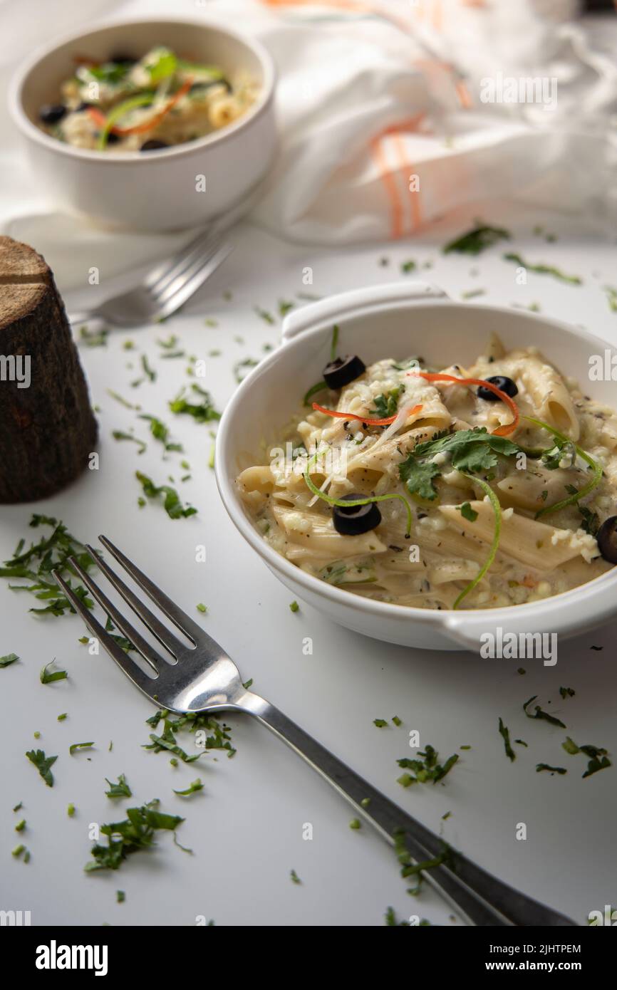 A vertical top view of an aesthetic table with delicious dish for lunch ...