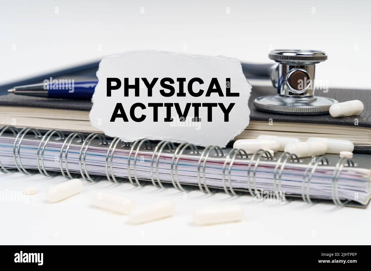 Medicine and health concept. On the table is a stethoscope, a diary and ...