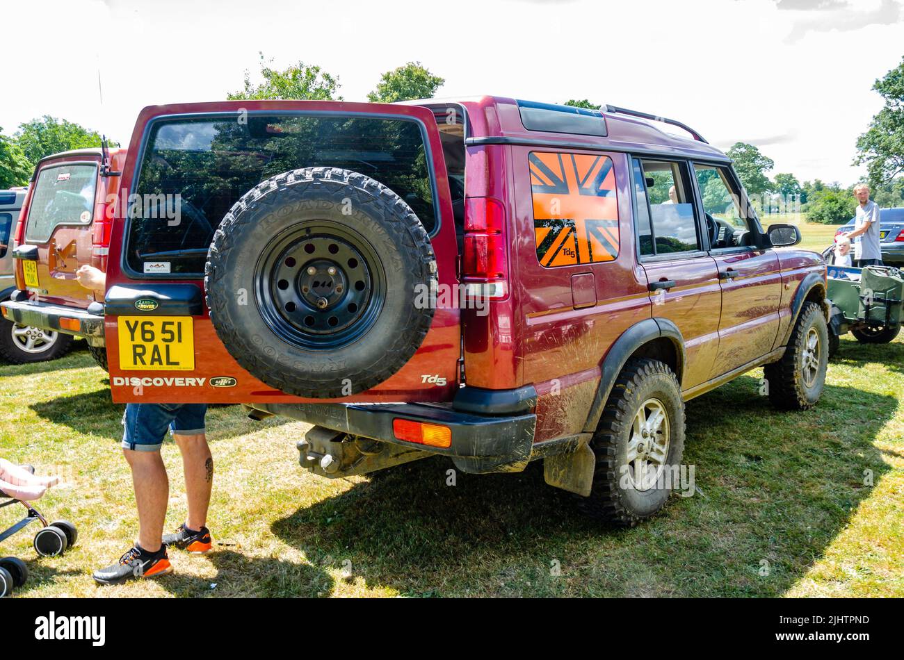 Rear view of a 2001 Land Rover Discovery All-terrain vehicle in red ...