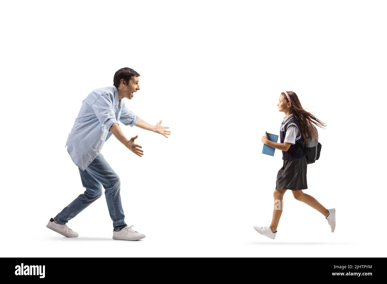 Father meeting his schoolgirl daughter with arms wide open isolated on ...
