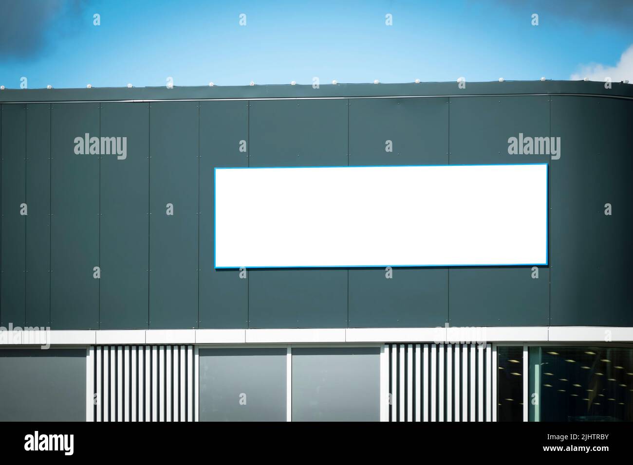 Mock up template. Big horizontal white blank signboard, advertising ...