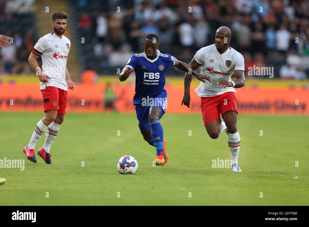 Óscar Estupiñán #19 of Hull City challenges Nampalys Mendy #24 of Leicester City for the ball ...