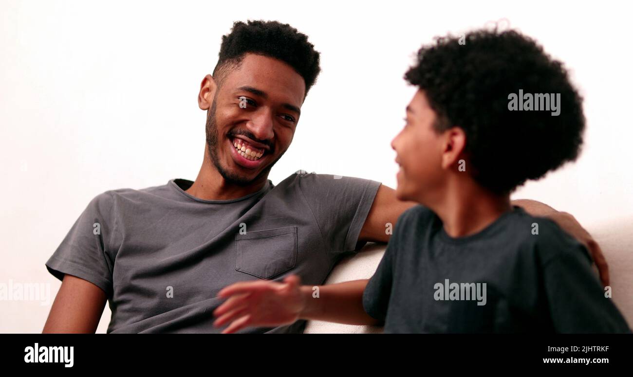 Two brothers talk interaction, black african siblings in conversation ...