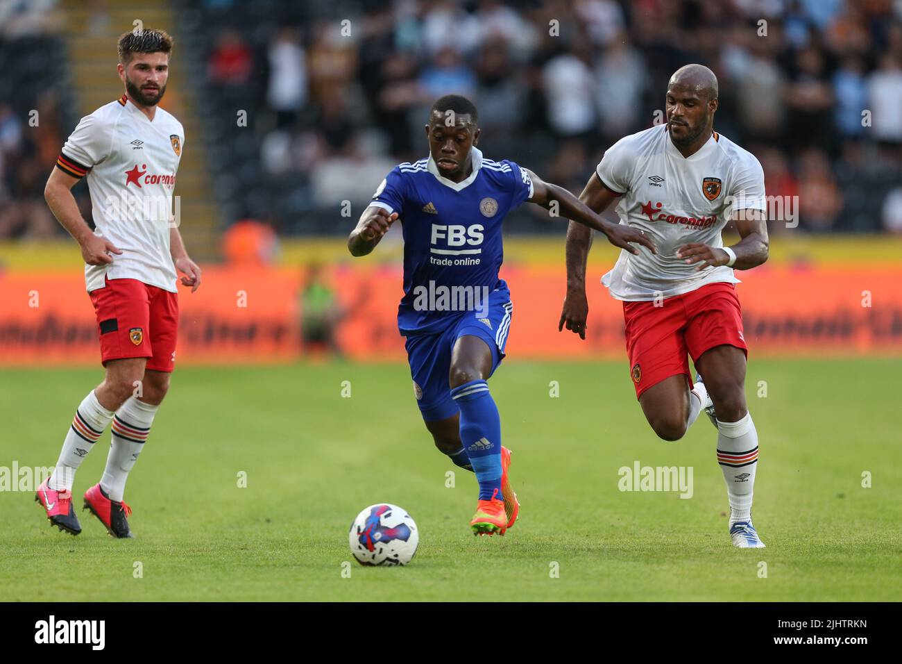 Óscar Estupiñán #19 of Hull City challenges Nampalys Mendy #24 of Leicester City for the ball ...