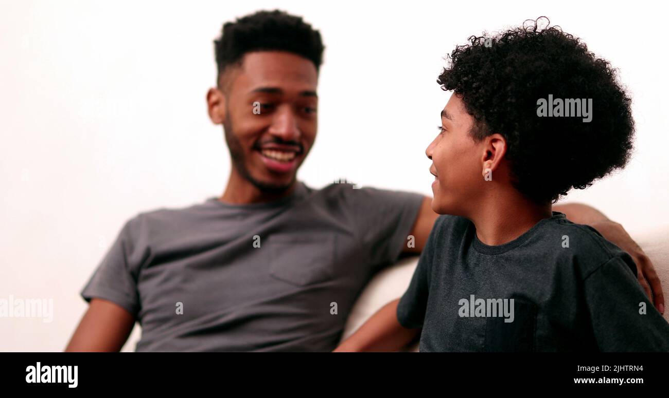 Two brothers talk interaction, black african siblings in conversation ...