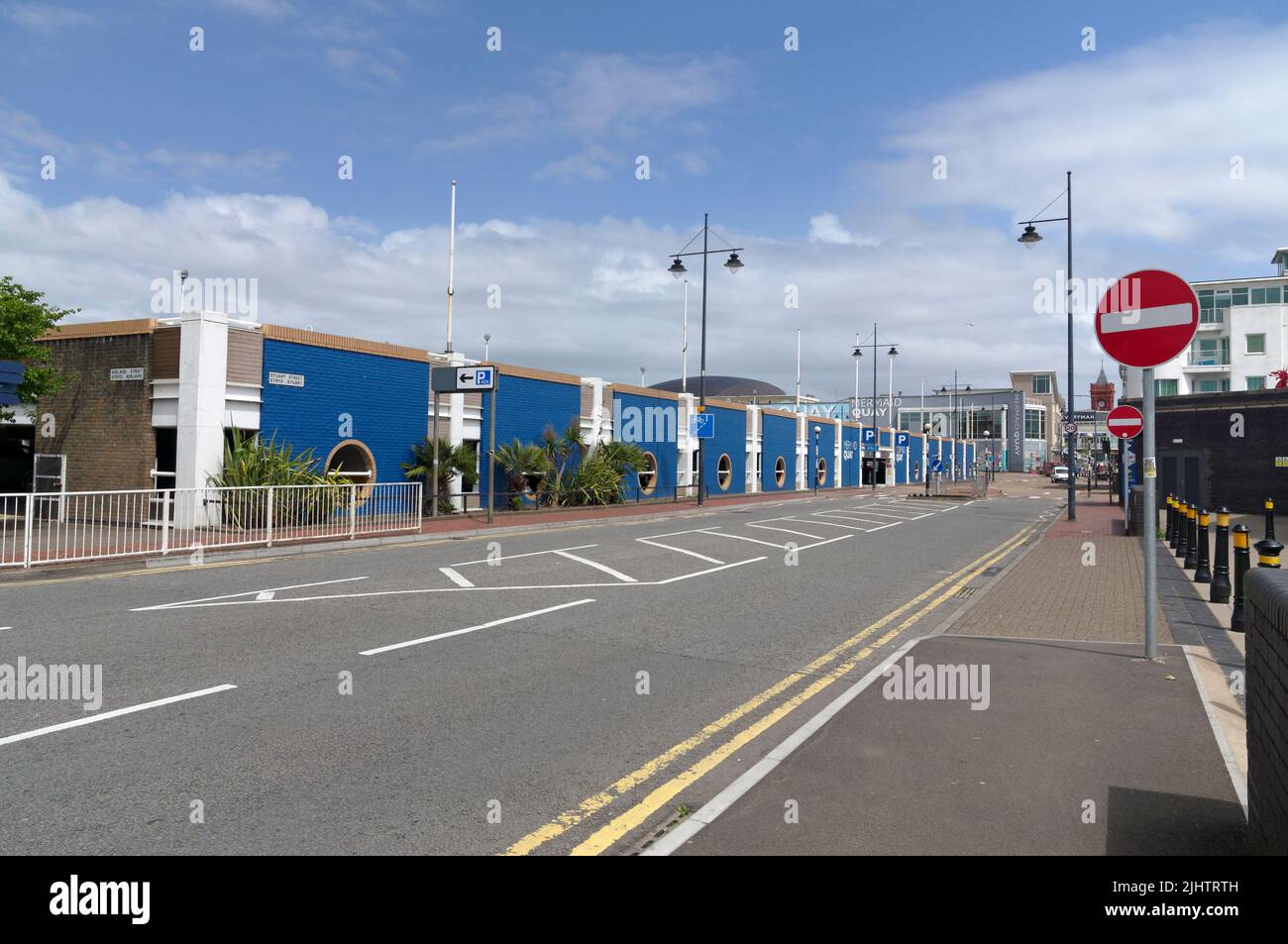 Attractive blue and white painted low level car park near Mermaid Quay ...
