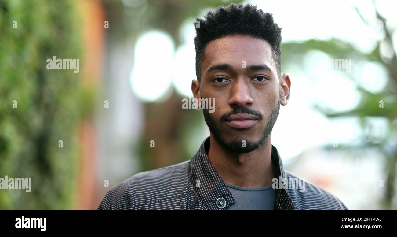 Young African man walking forward. Confident black ethnicity guy ...