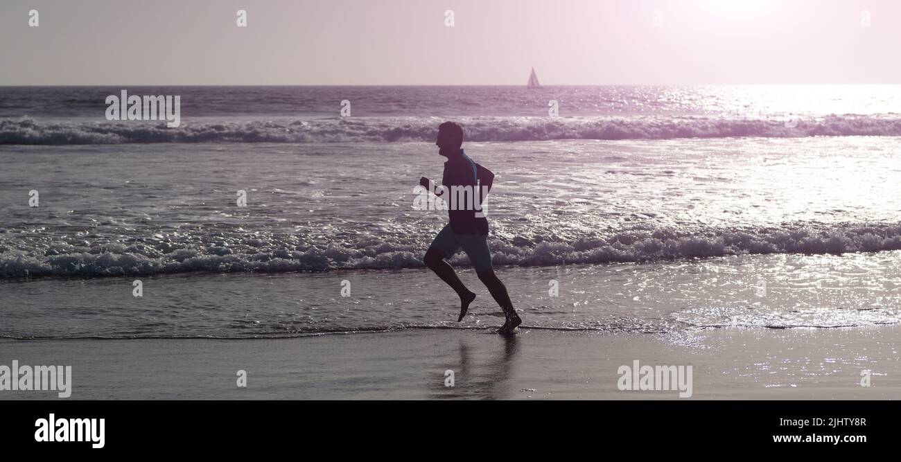 Man running and jumping, banner with copy space. healthy man running on ...