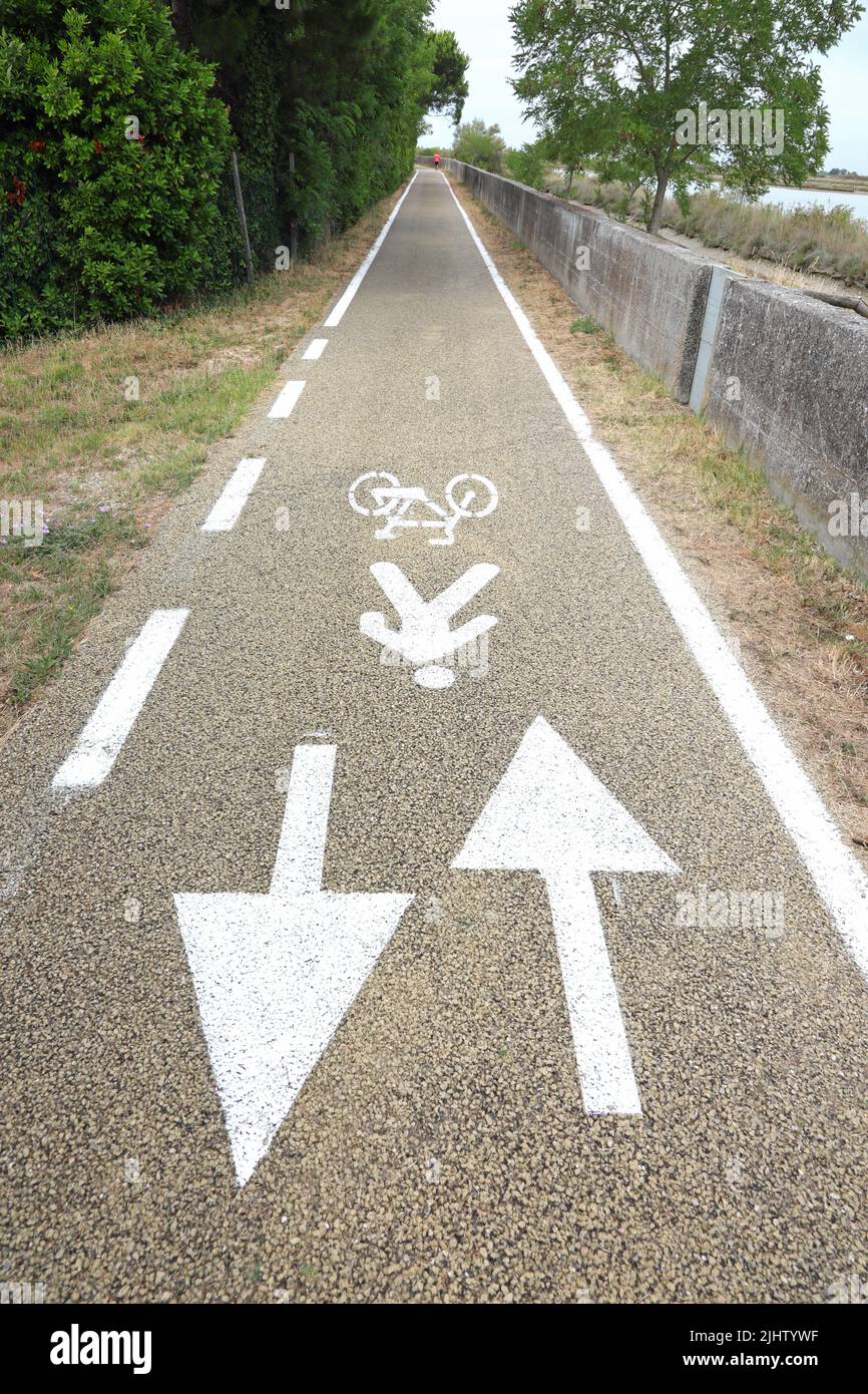 cycle path in the Plain with the symbol of arrows to indicate the ...