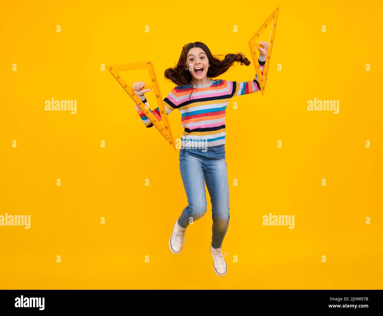 Amazed teenager. Back to school. Teenager school girl on isolated ...