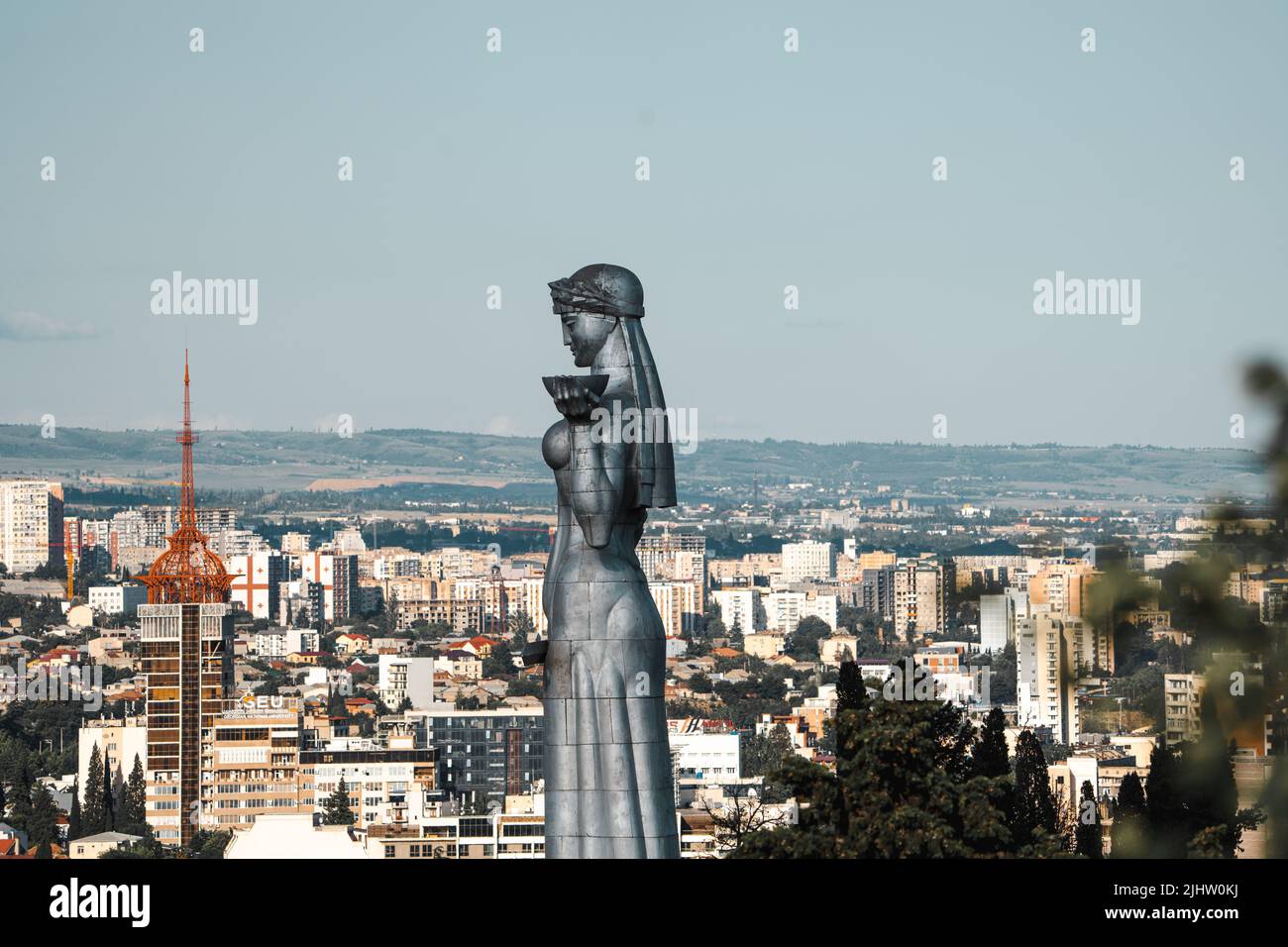 The Mother of Georgia monument with buildings in the background in ...