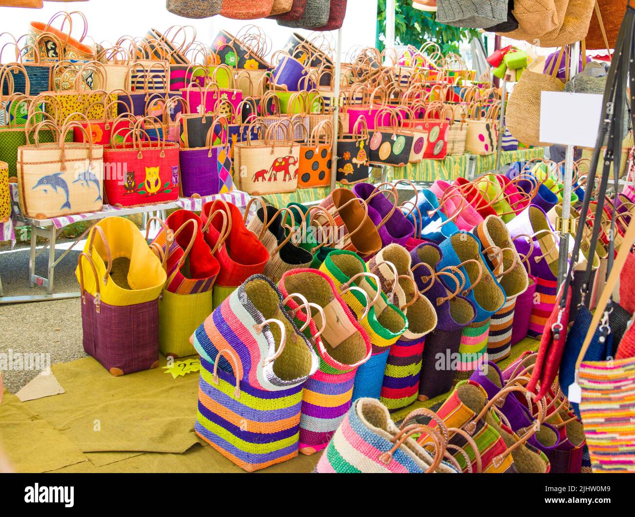 Colorful straw bags at a market in Provence France Stock Photo - Alamy