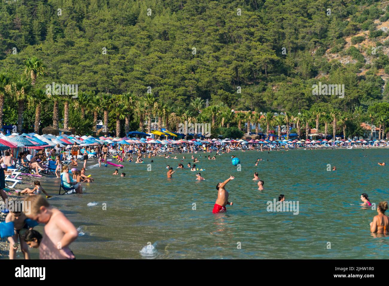 Oren, Milas, Mugla, Turkey - July 14, 2022: People on vacation in Oren ...