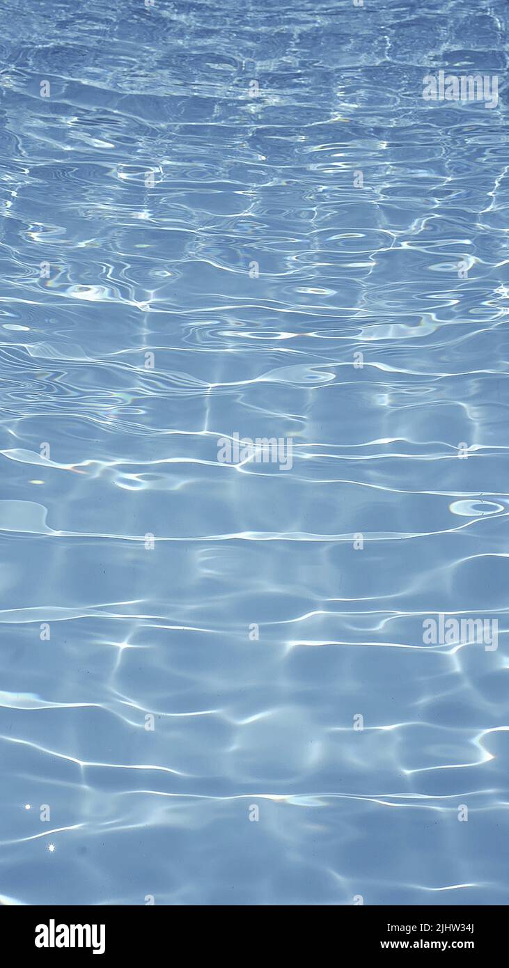A vertical shot of a water-textured background Stock Photo - Alamy