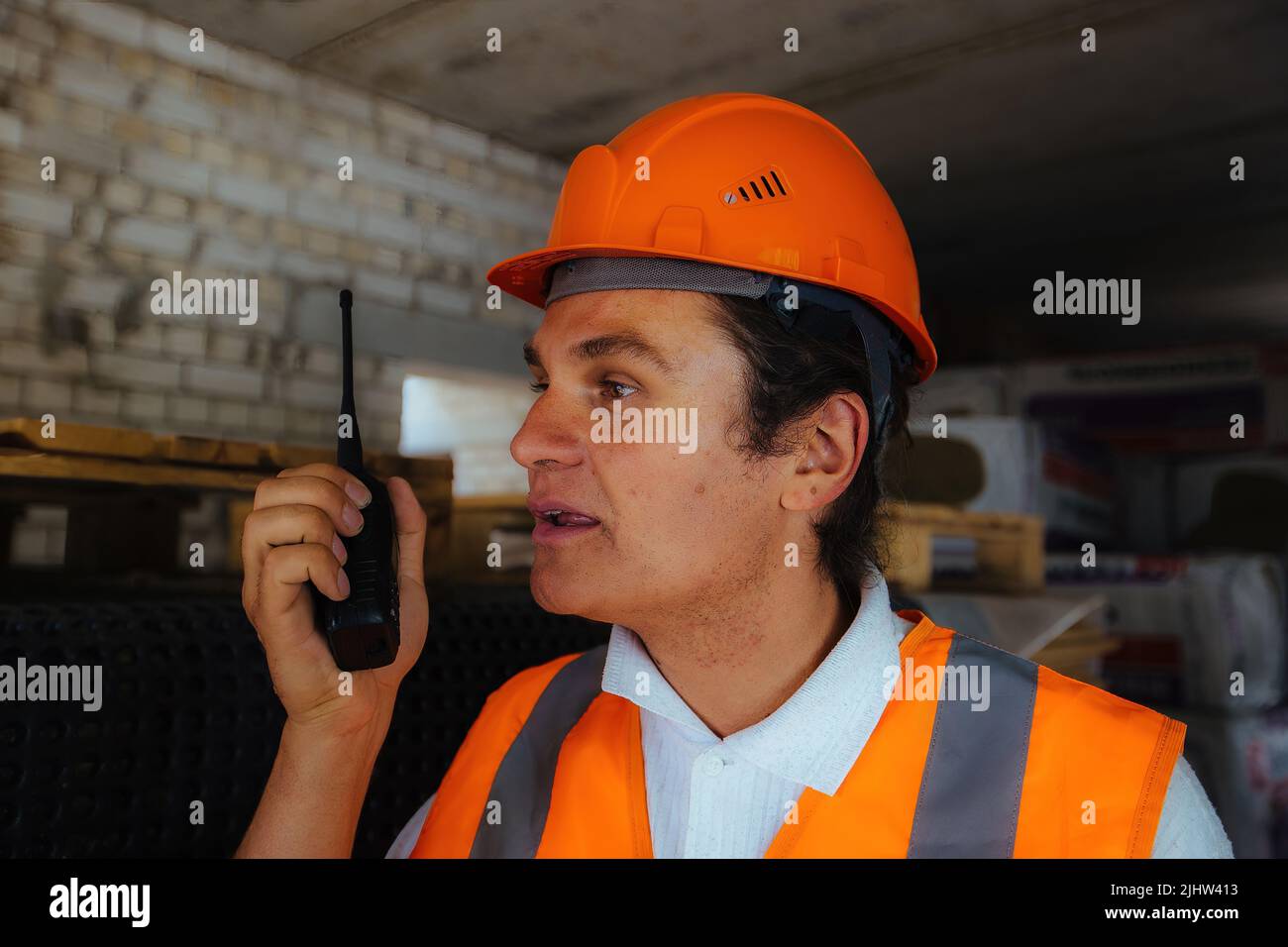 Industrial worker on radio hi-res stock photography and images - Alamy