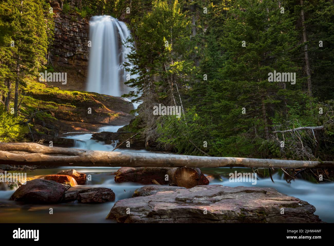Virginia Falls, photographed in motion-blur, is a 50-foot waterfall at ...