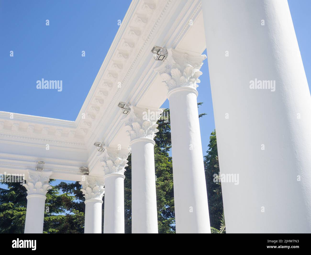 white columns. Modern Architecture. Building in the park. Exterior ...