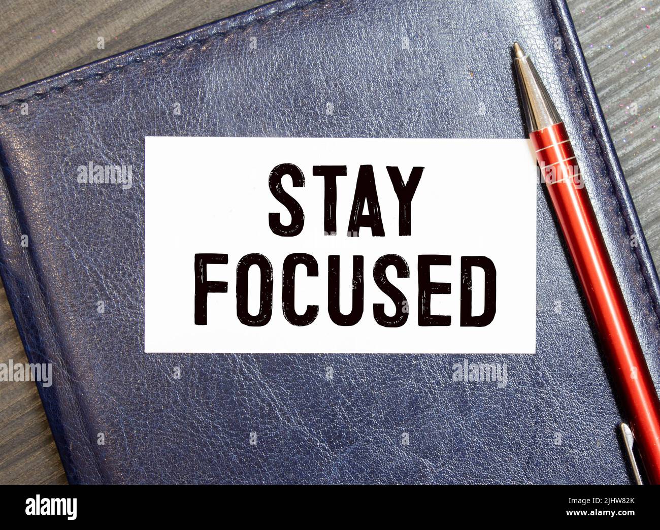 Stay Focused write on Sticky Notes Stock Photo - Alamy