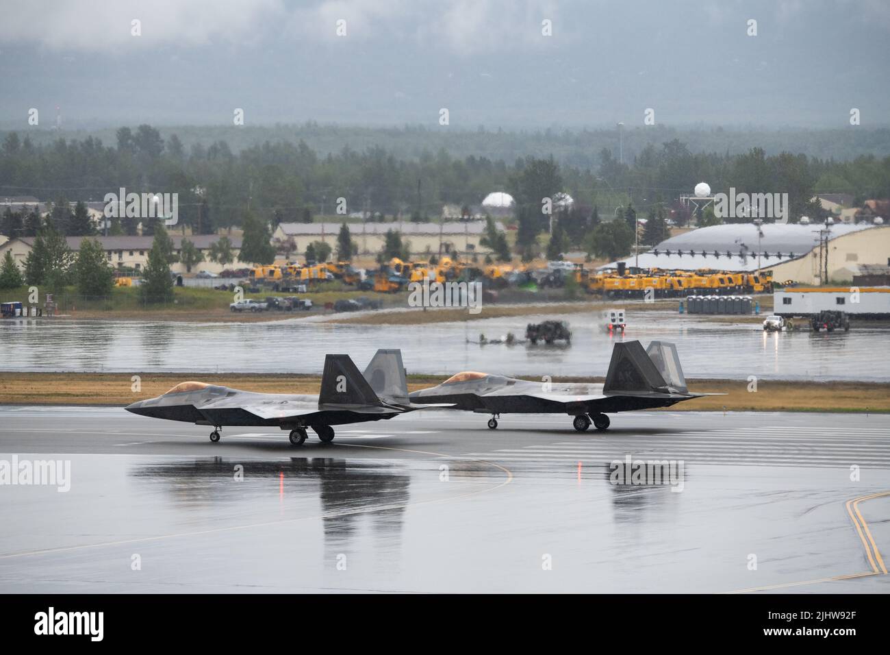 U.S. Air Force F-22 Raptors assigned to the 3rd Wing conduct training ...