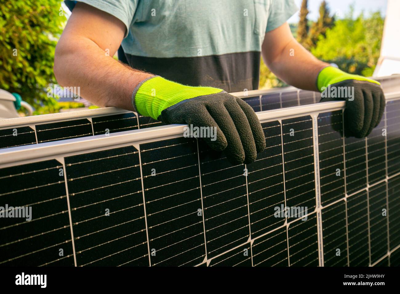 Solar panel in the hands of a worker.solar power technology.Smart ...