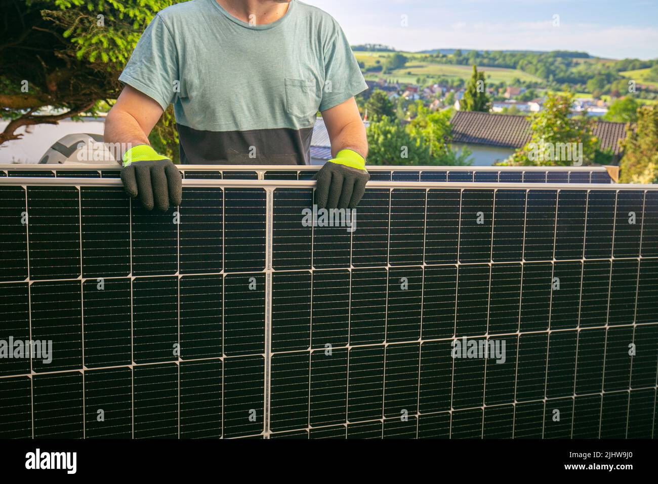Solar panel in the hands of a worker.Smart consumption and energy ...
