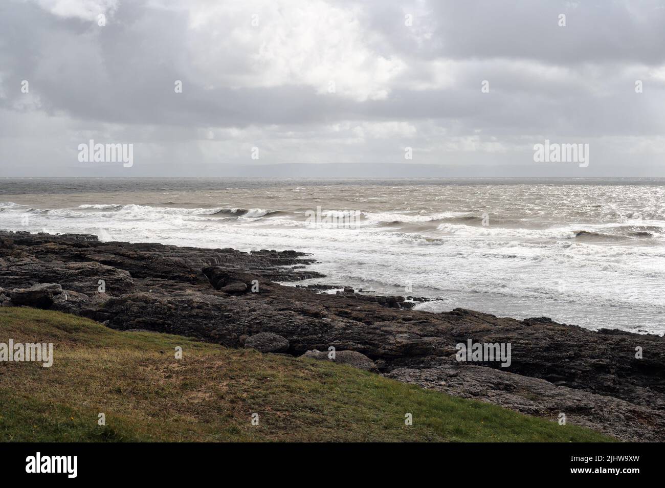 The coast and waves at Ogmore by Sea in Wales, welsh coastline UK in ...