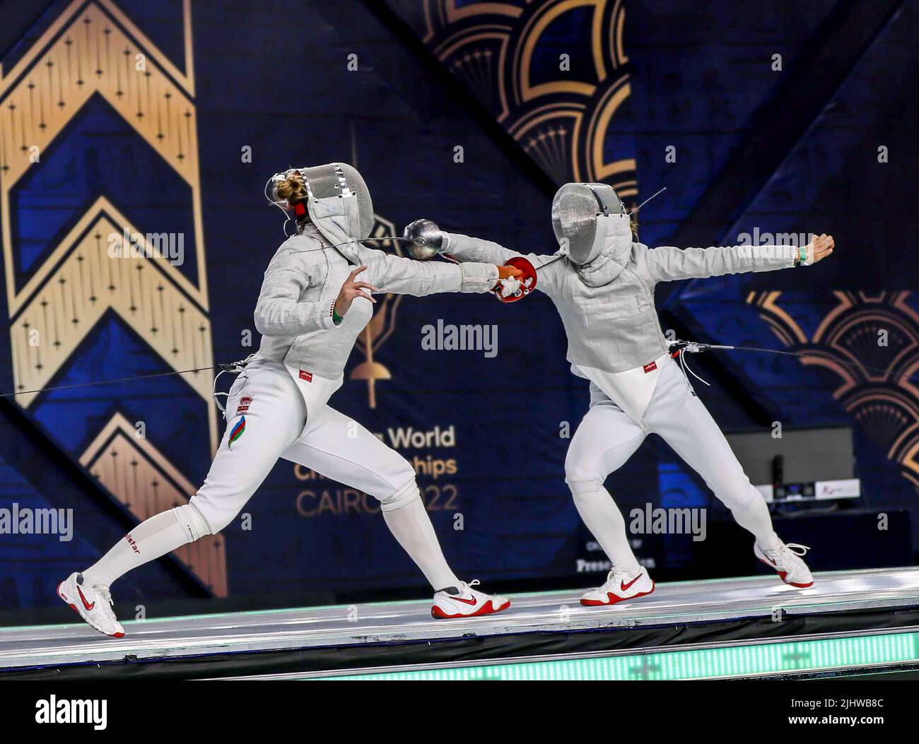 Cairo, Egypt. 20th July, 2022. Emura Misaki (R) of Japan competes ...
