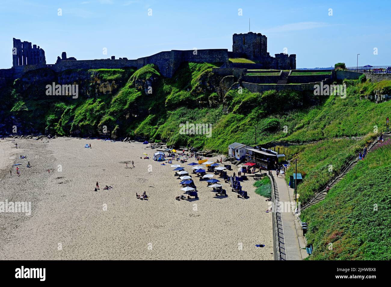 King Edwards Bay beach Tynemouth and Rileys Fish Bar restaurant people ...