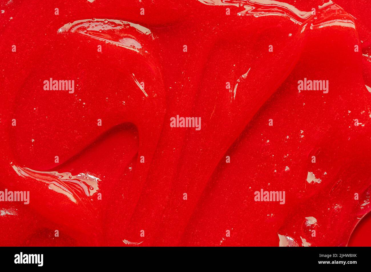 Red gel texture. Cosmetic clear liquid cream smudge. Skin care product ...