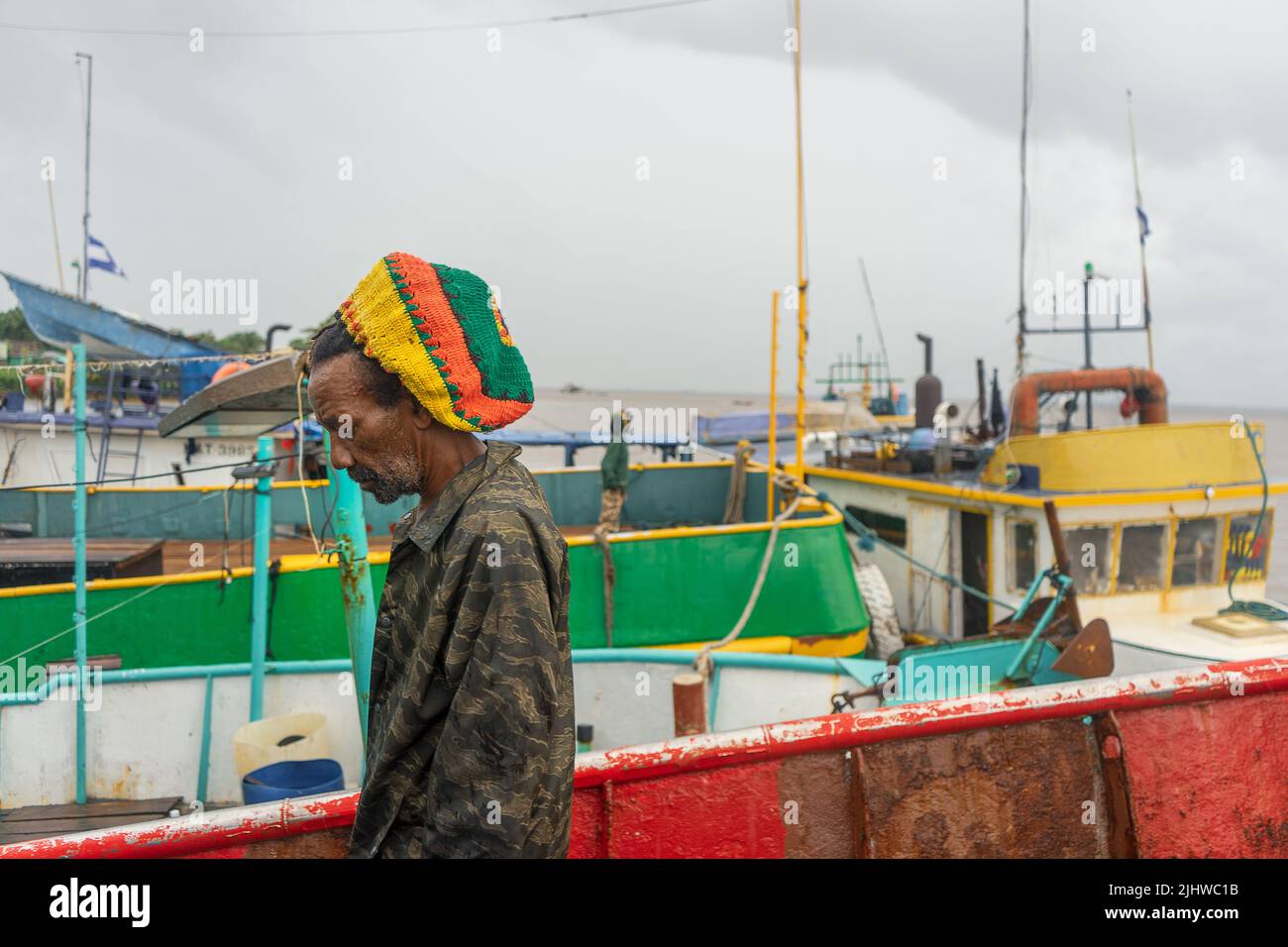Caribbean black man fishing boat hi-res stock photography and images ...