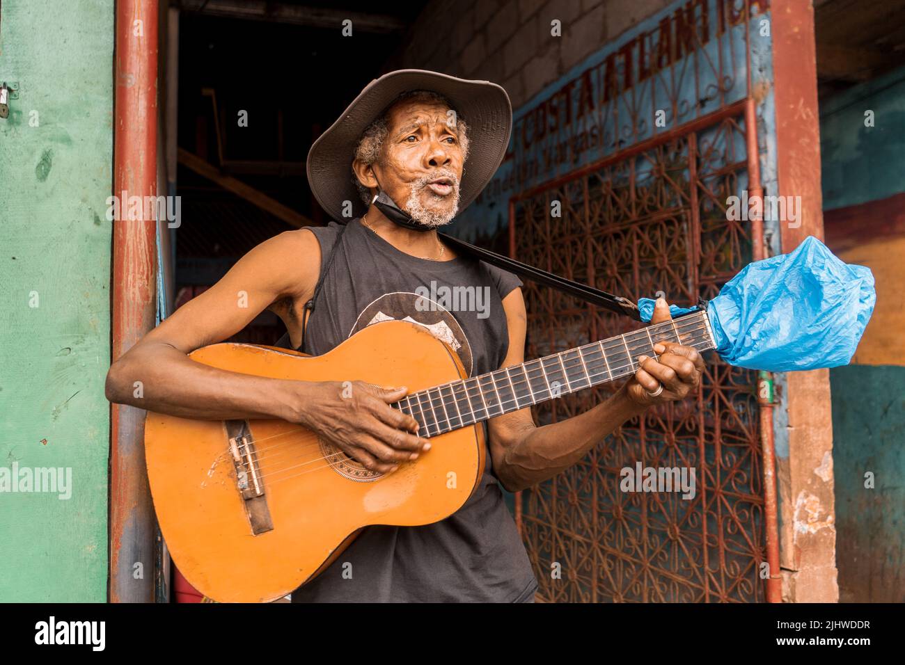 Native African American singer from Bluefields playing guitar and ...