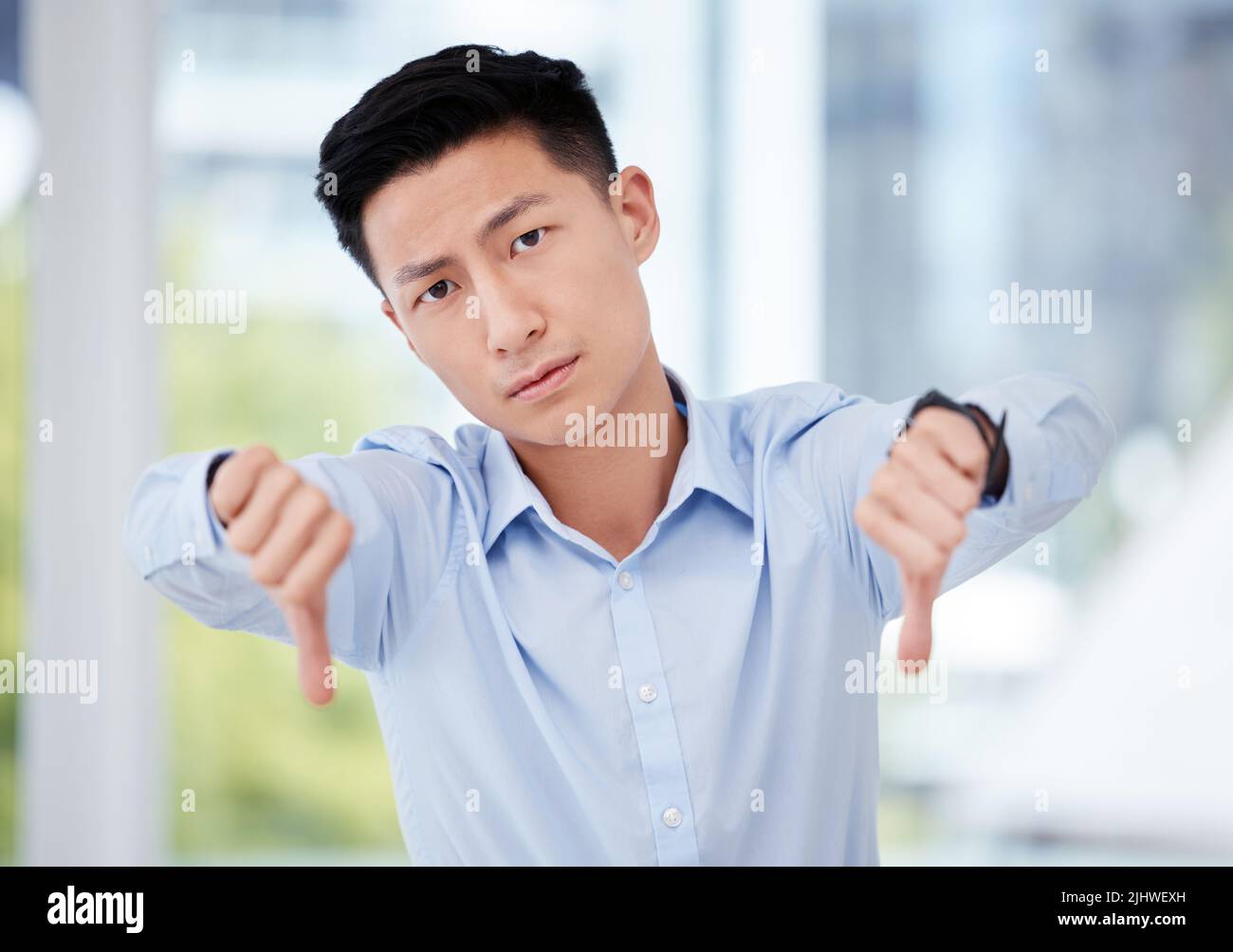 Businessman thumbs down hi-res stock photography and images - Alamy