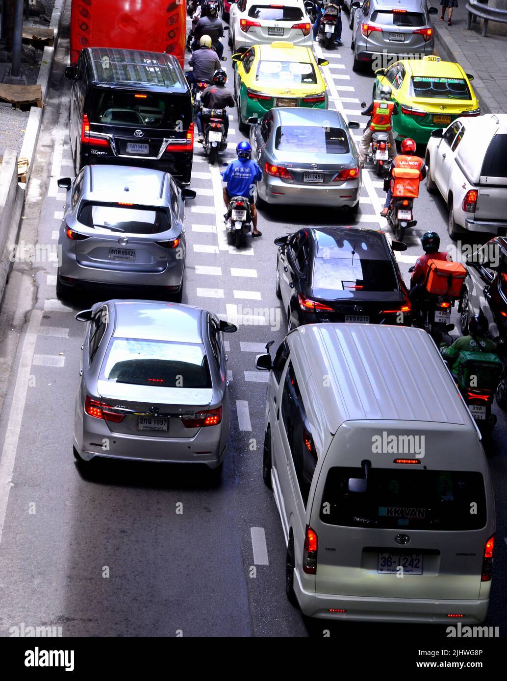 Traffic jam of cars and motorbikes on Silom Road, Bangkok, Thailand ...