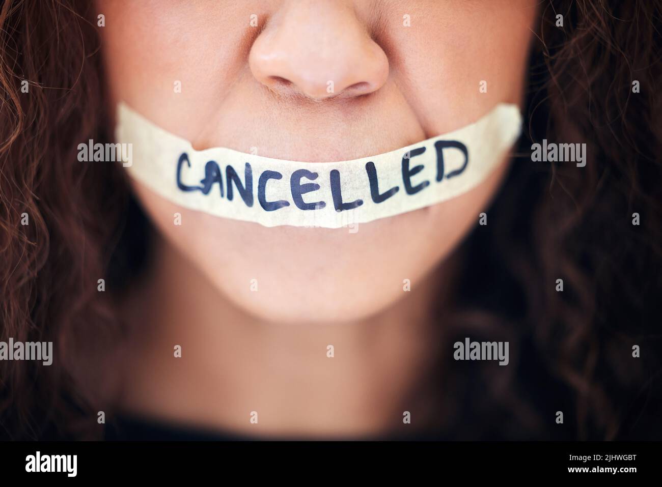 Open your mind before your mouth. Closeup shot of an unrecognisable ...