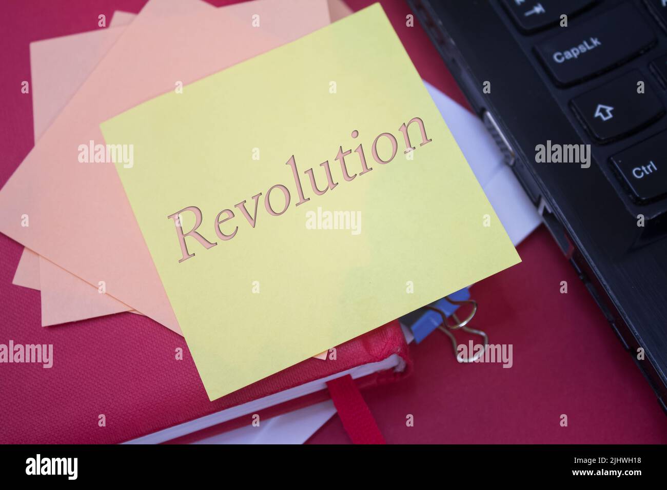 Revolution. Text on adhesive note paper. Event, celebration reminder ... Revolution. Text on adhesive note paper. Event, celebration reminder ...