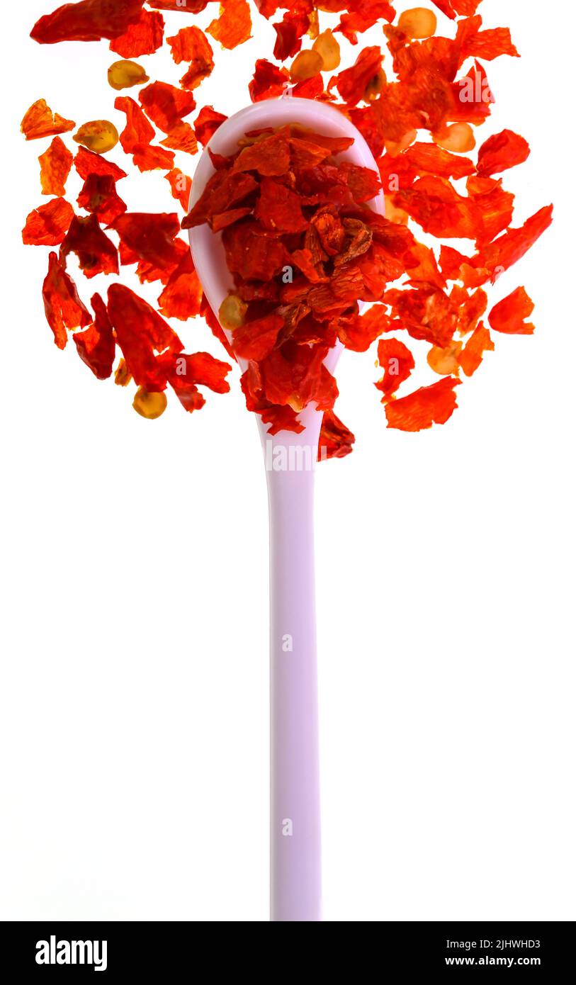 Sun dried homemade chili peppers flakes used in many cuisines as a ...