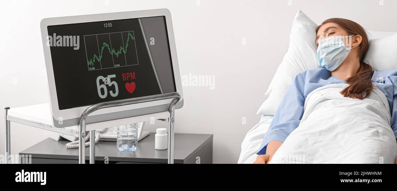 Modern heart rate monitor in ward of ill woman Stock Photo - Alamy