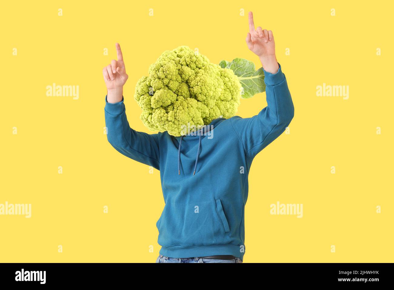 Happy man with fresh green cauliflower cabbage instead of his head on ...