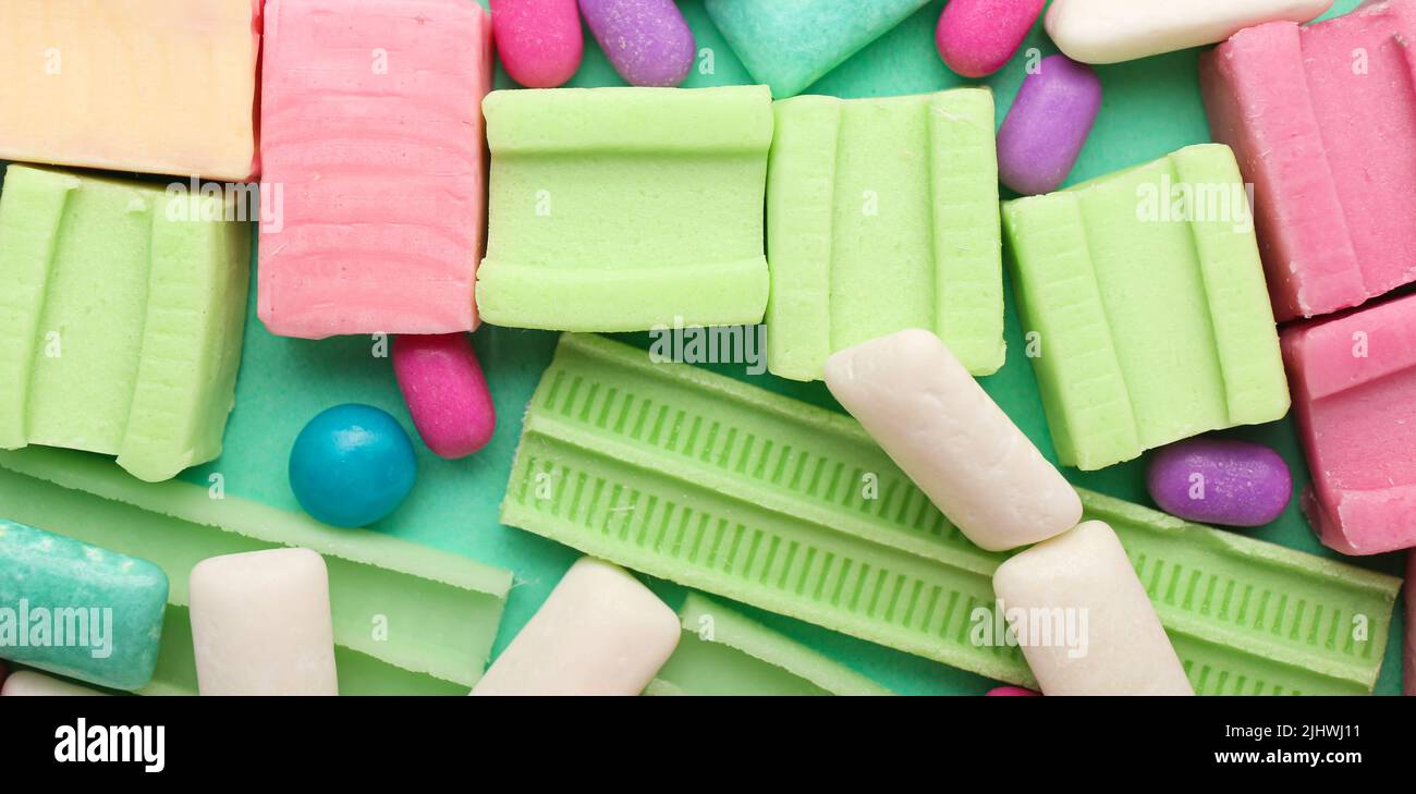 Different chewing gums on color background, closeup Stock Photo - Alamy