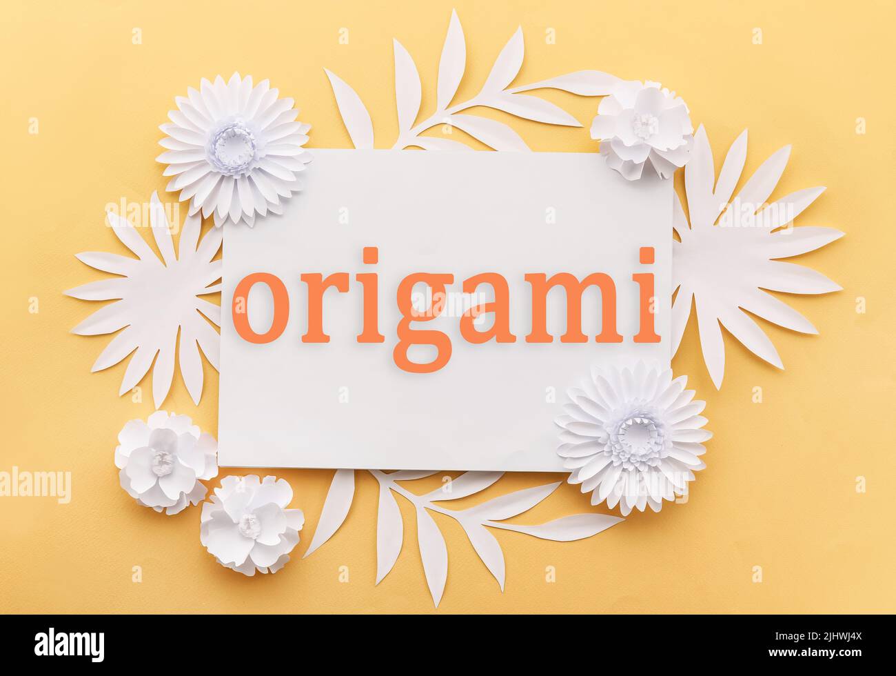 Beautiful handmade paper flowers, tropical leaves and card with word ...