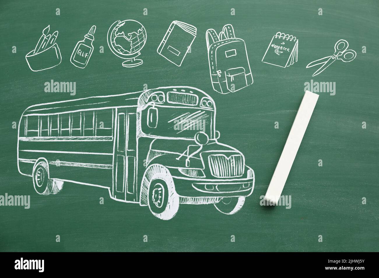 Drawing of school bus with stationery and chalk on blackboard Stock ...