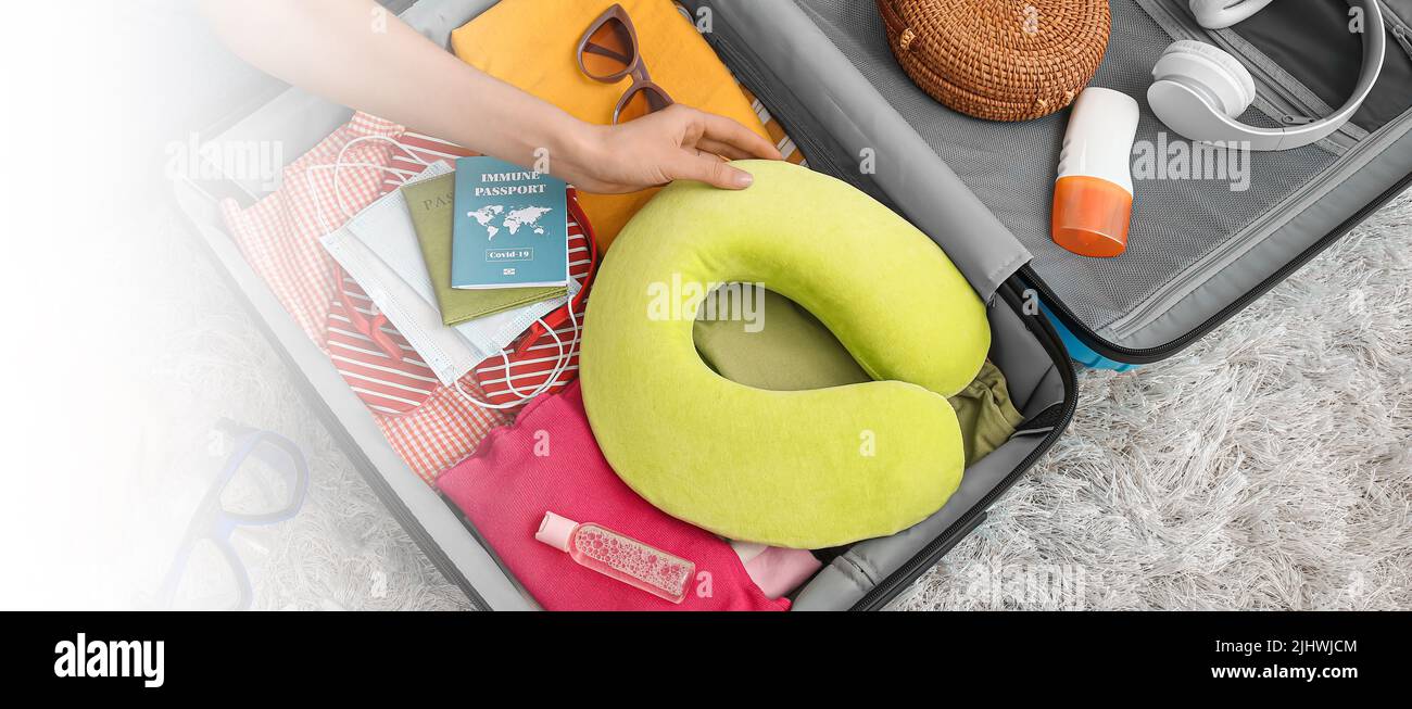 Woman packing suitcase at home. Banner for design Stock Photo - Alamy