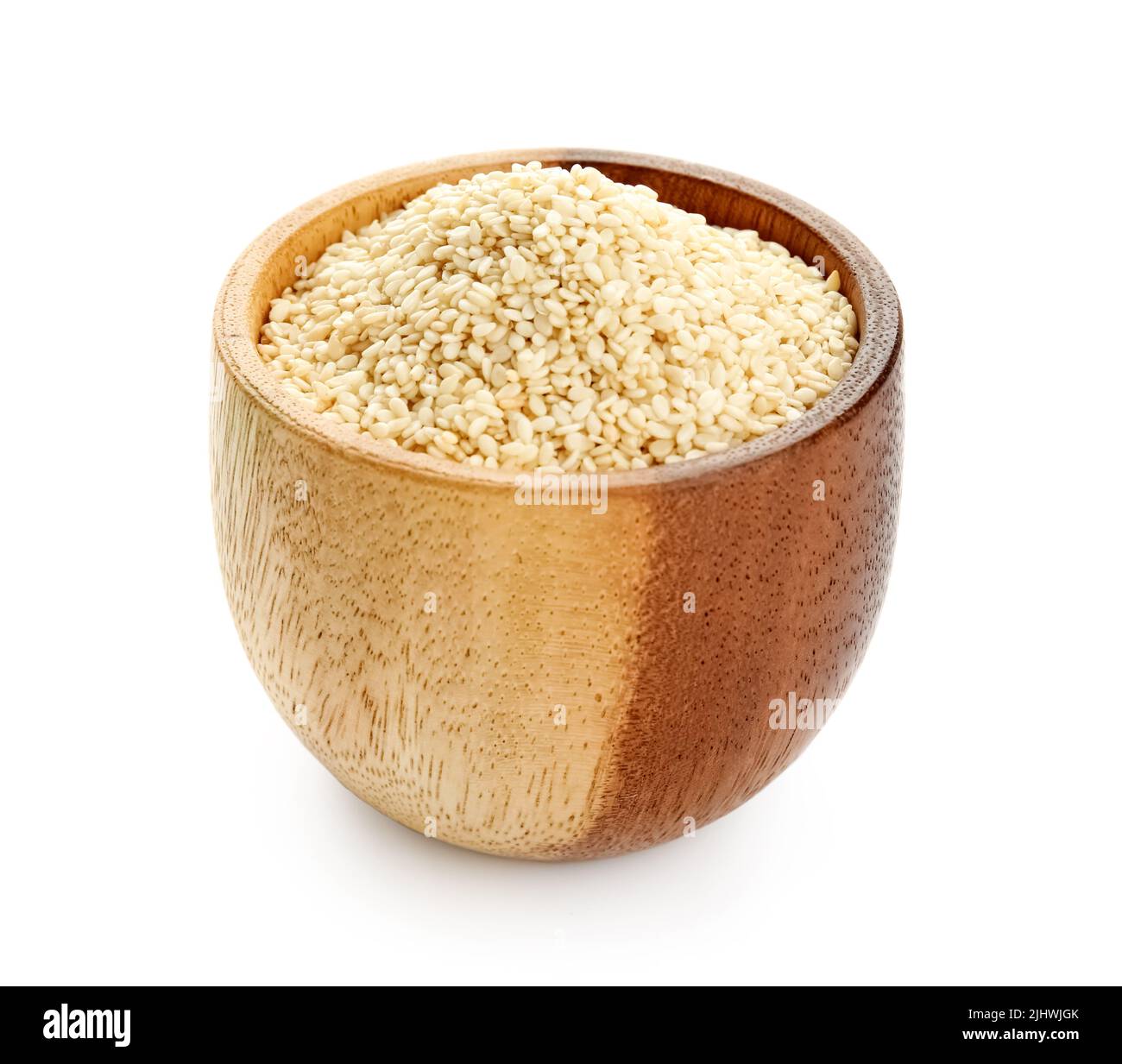 Wooden bowl of sesame seeds isolated on white background Stock Photo ...