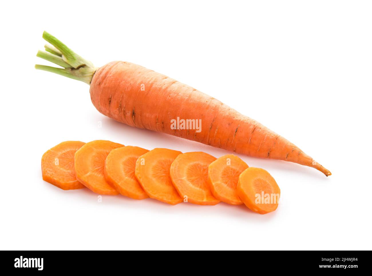 Fresh carrot and cut pieces on white background Stock Photo - Alamy