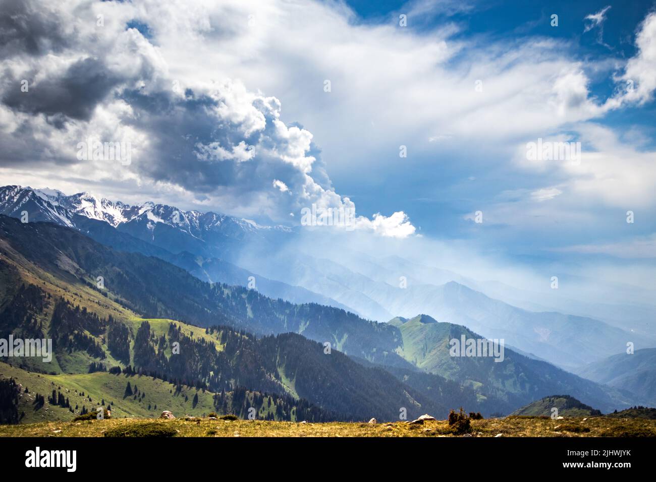 Amazing landscape of summer in Almaty cloudy mountains. Travel ...