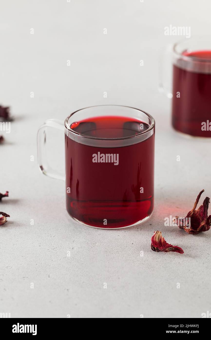 Herbal tea made from hibiscus petals in a transparent cup Stock Photo ...