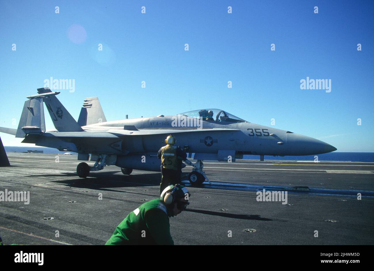 United States Navy F/A-18 from VFA-125 positions on the catapult Stock ...